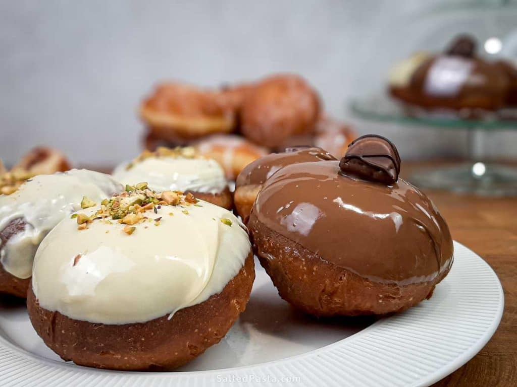 Polish Pączki with Pistachio and Kinder Bueno Cream - SaltedPasta